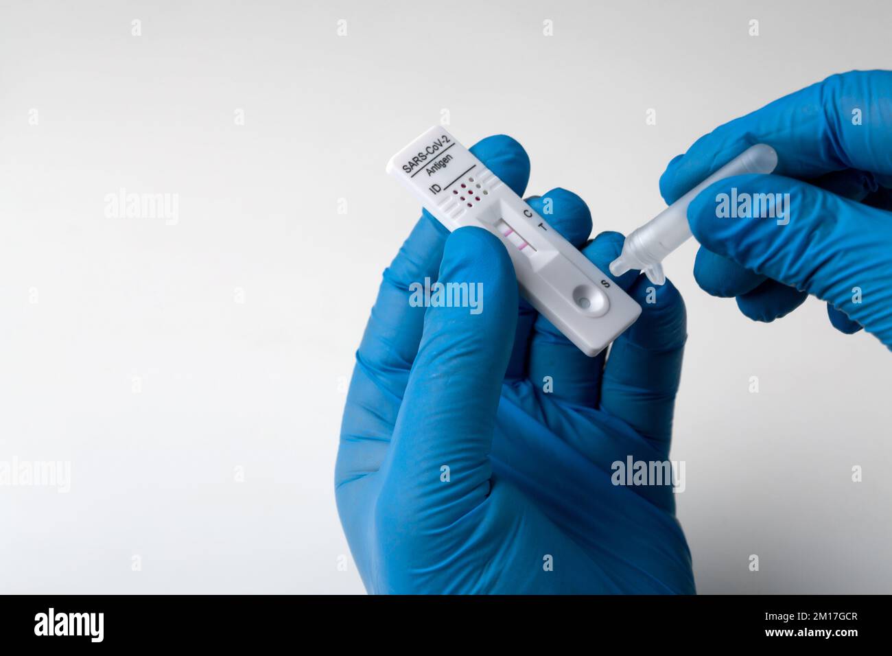 Express corona test. Positive covid antigen test Stock Photo - Alamy