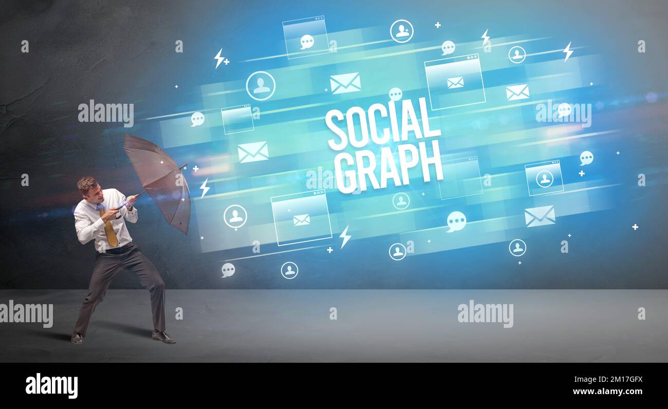 businessman defending with umbrella concept Stock Photo - Alamy