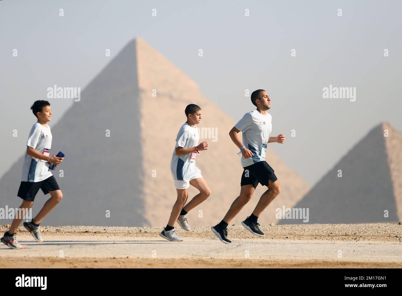 Cairo, Egypt. 10th Dec, 2022. Runners participate in the Pyramids Half ...