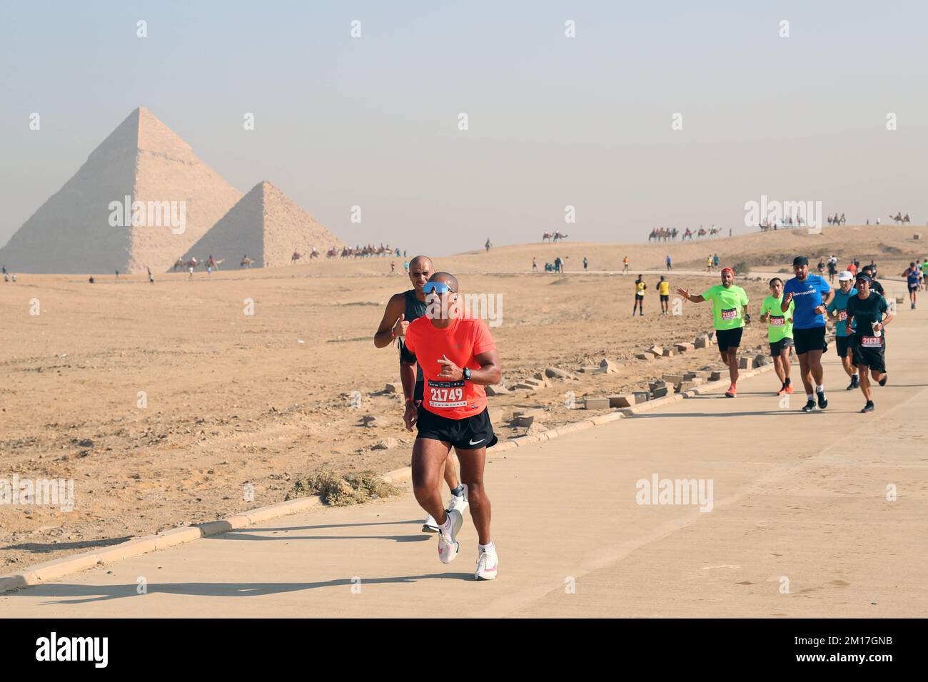 Cairo, Egypt. 10th Dec, 2022. Runners participate in the Pyramids Half ...