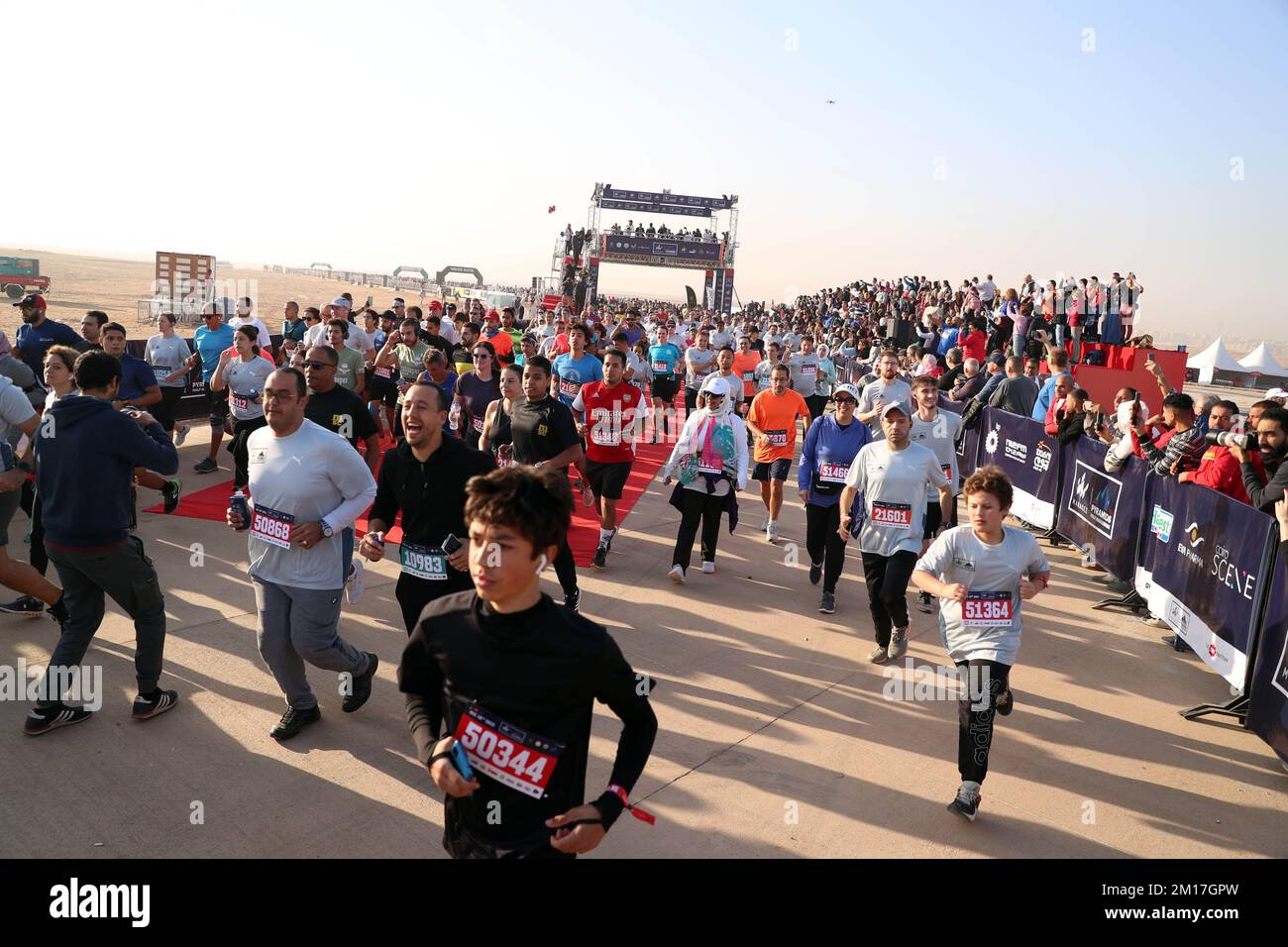 Cairo, Egypt. 10th Dec, 2022. Runners participate in the Pyramids Half ...