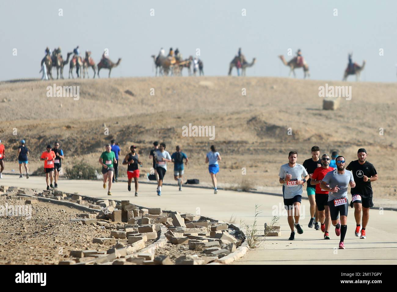 Cairo, Egypt. 10th Dec, 2022. Runners participate in the Pyramids Half ...