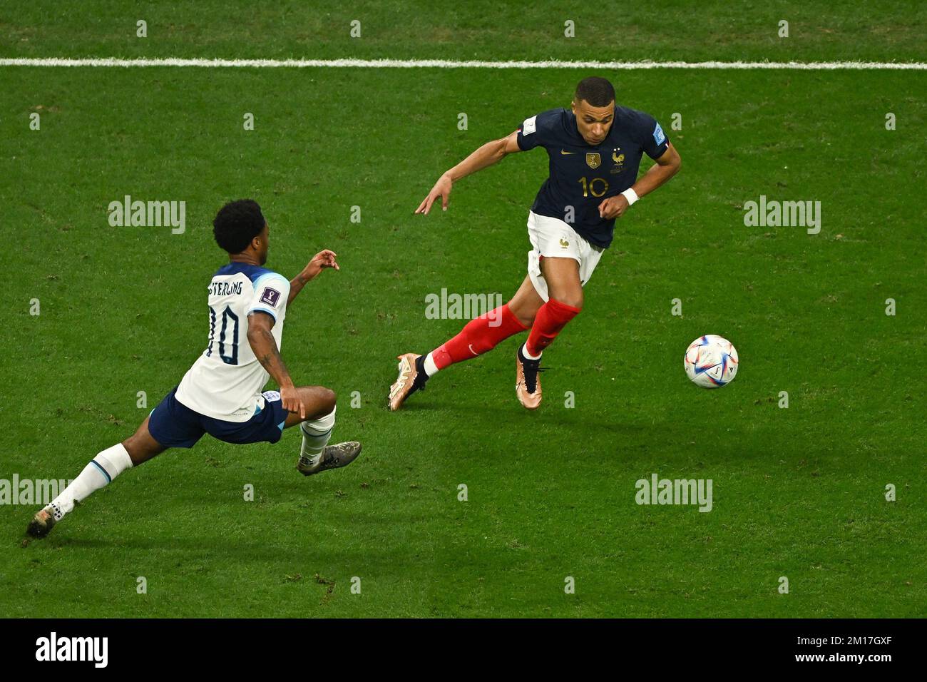 Kylian Mbappe of France and Raheem Sterling of England during England v ...