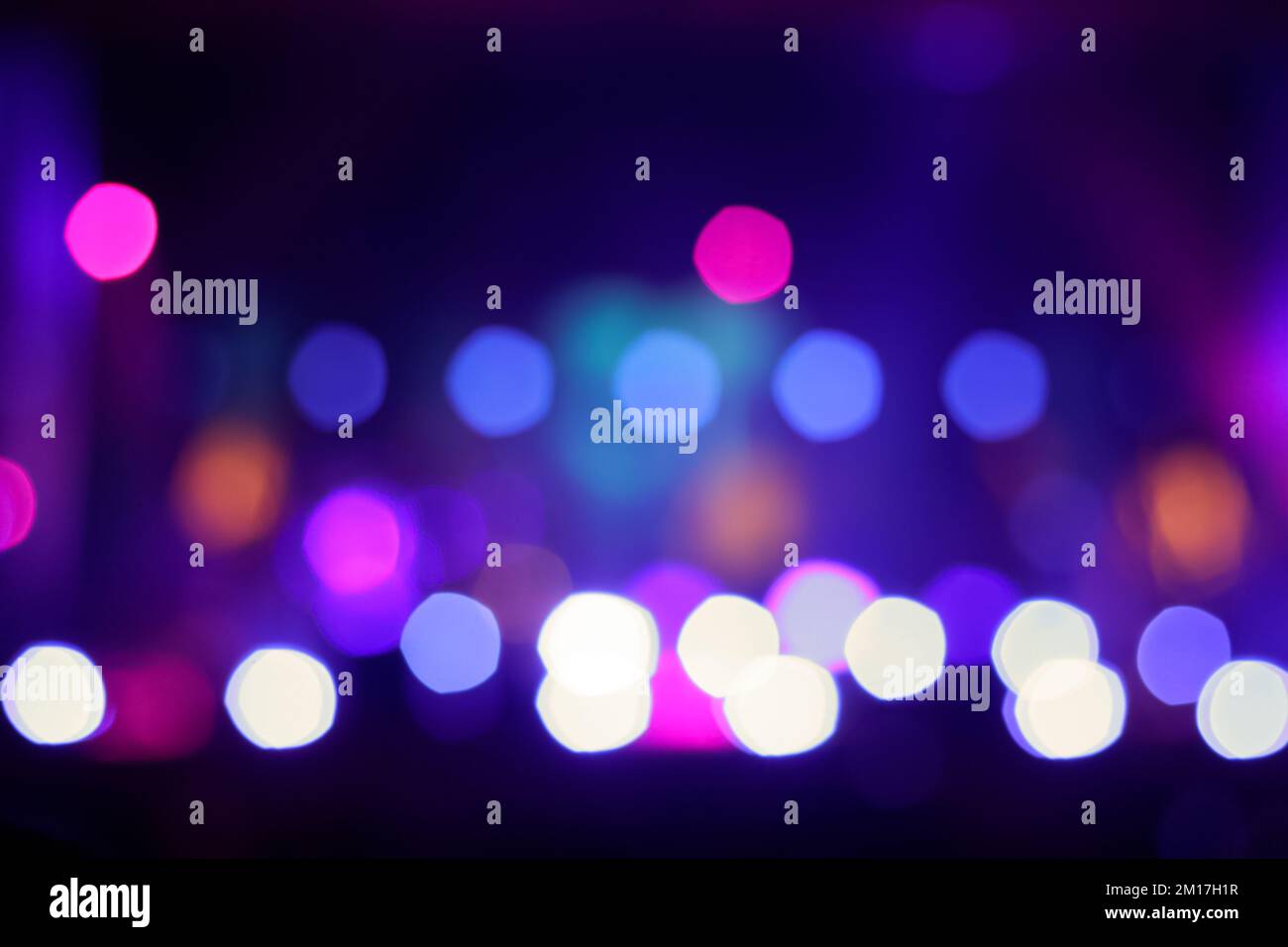 Defocus blurred abstract blue bokeh background. Festive spotted glitter ...