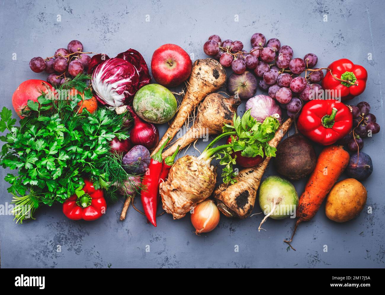 Food background with vegetables, root crops and fruits in string bag ...