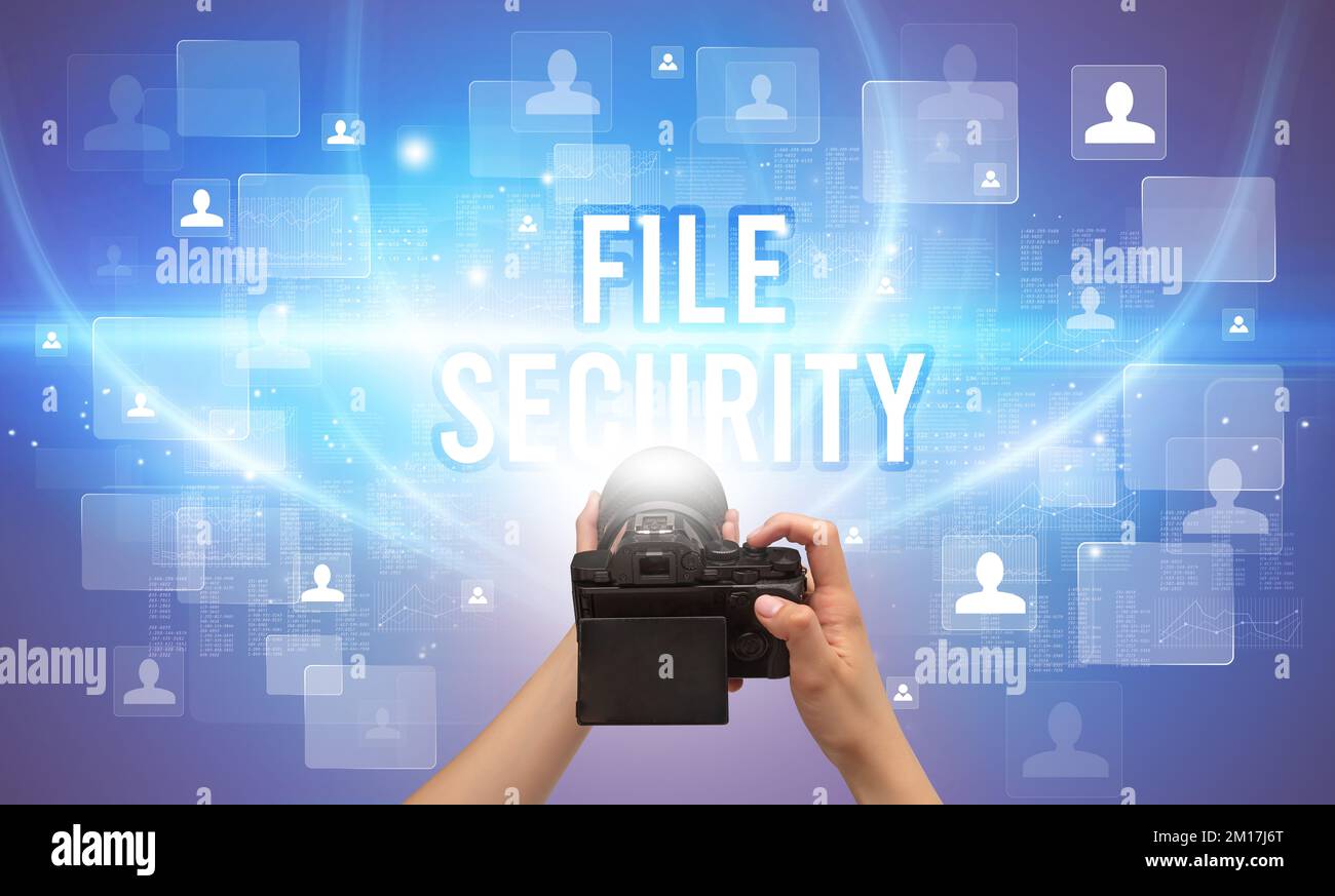 Close-up of hand holding camera Stock Photo - Alamy