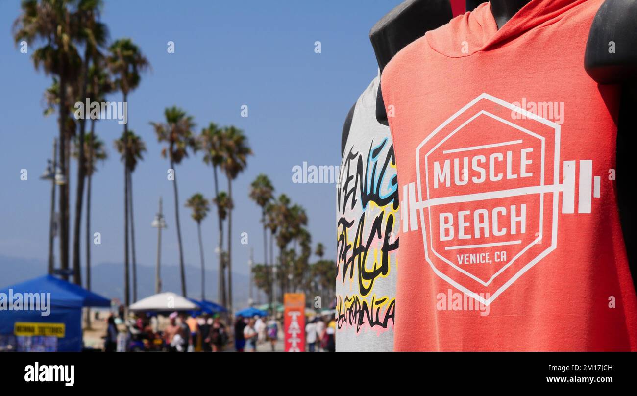 Close-up of a red Muscle Beach souvenir shirt next to the Muscle Beach ...