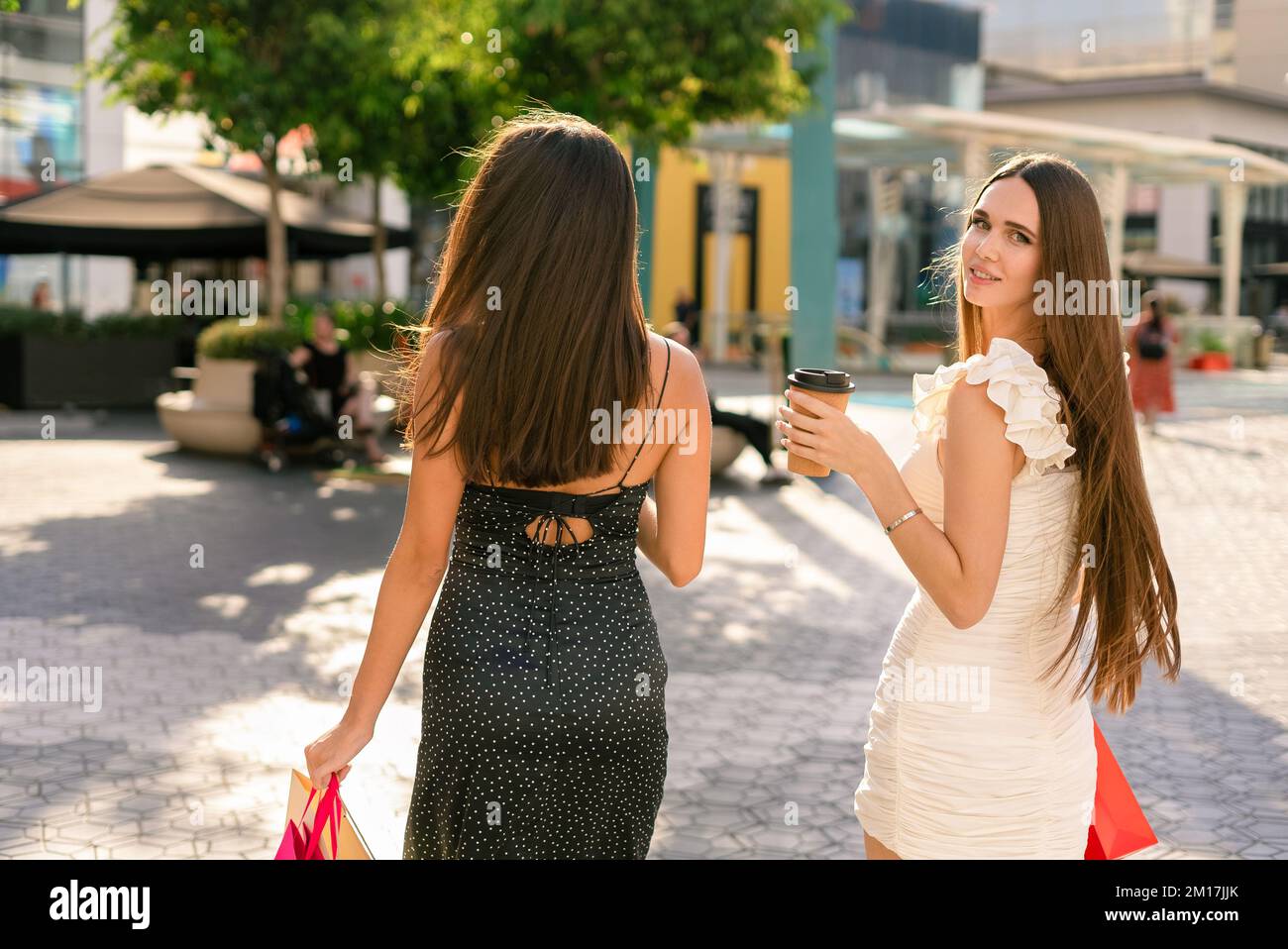 Women paper bags coffee hi-res stock photography and images - Alamy