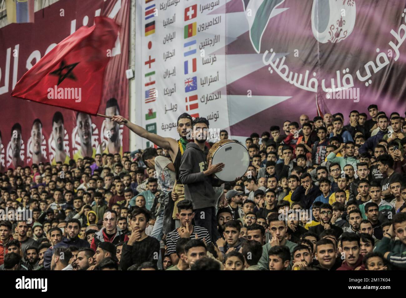 Gaza, Palestine. 10th Dec, 2022. Palestinians watch the live broadcast ...