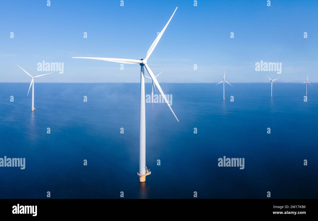 Aerial view at Windmill park with windmills turbines during winter ...