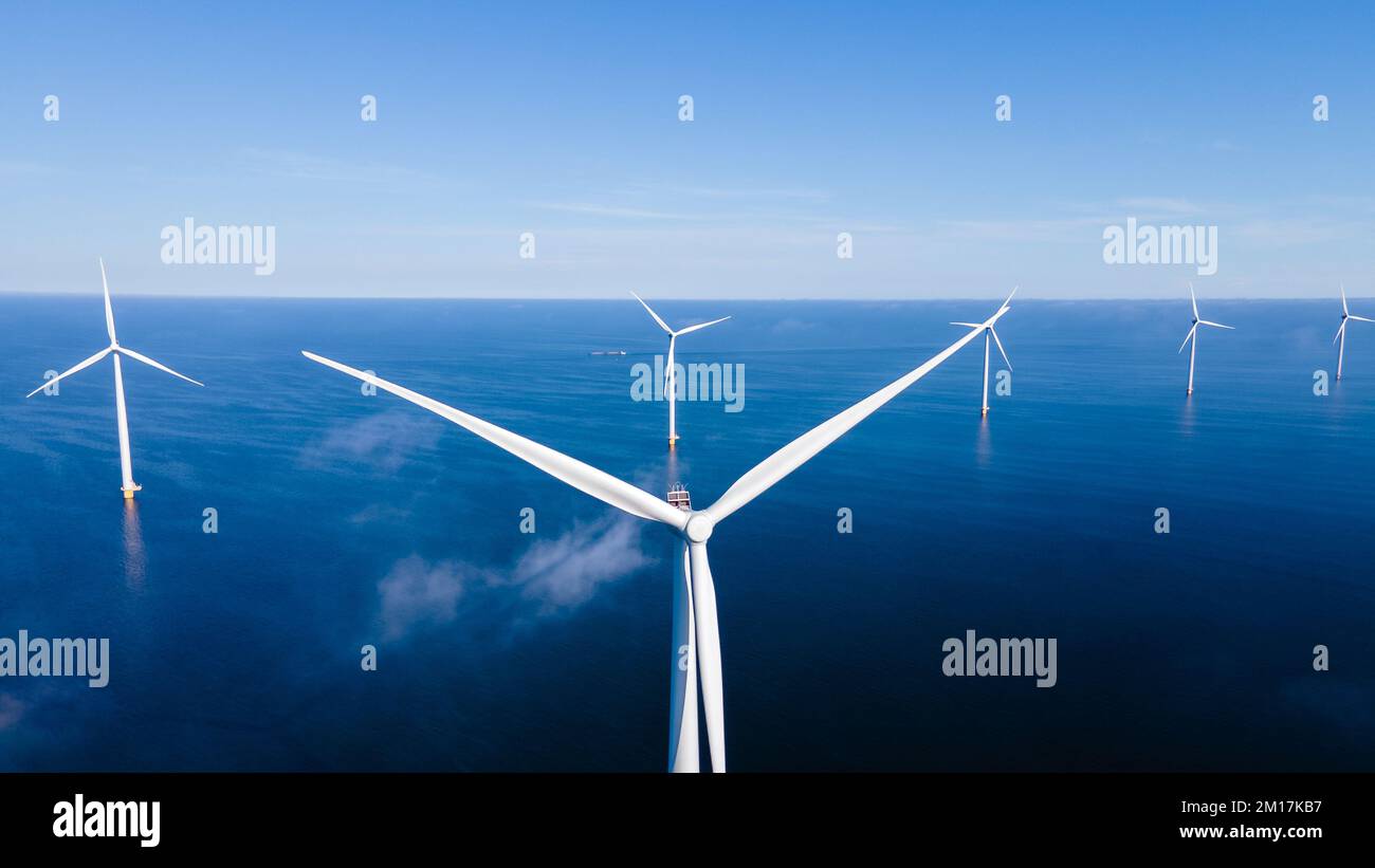 Aerial view at Windmill park with windmills turbines during winter huge ...