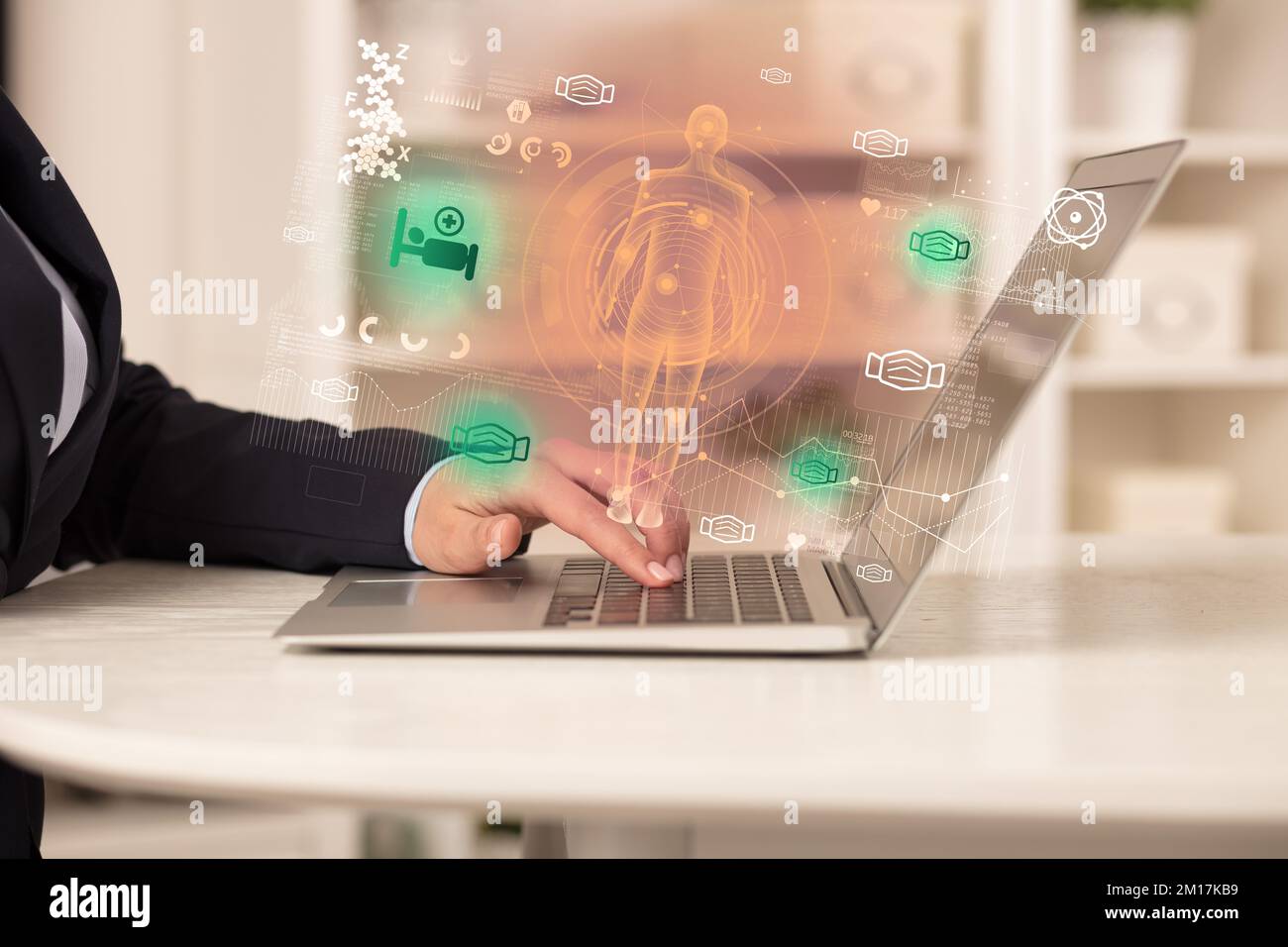 Doctor working on laptop with healthcare concept Stock Photo - Alamy