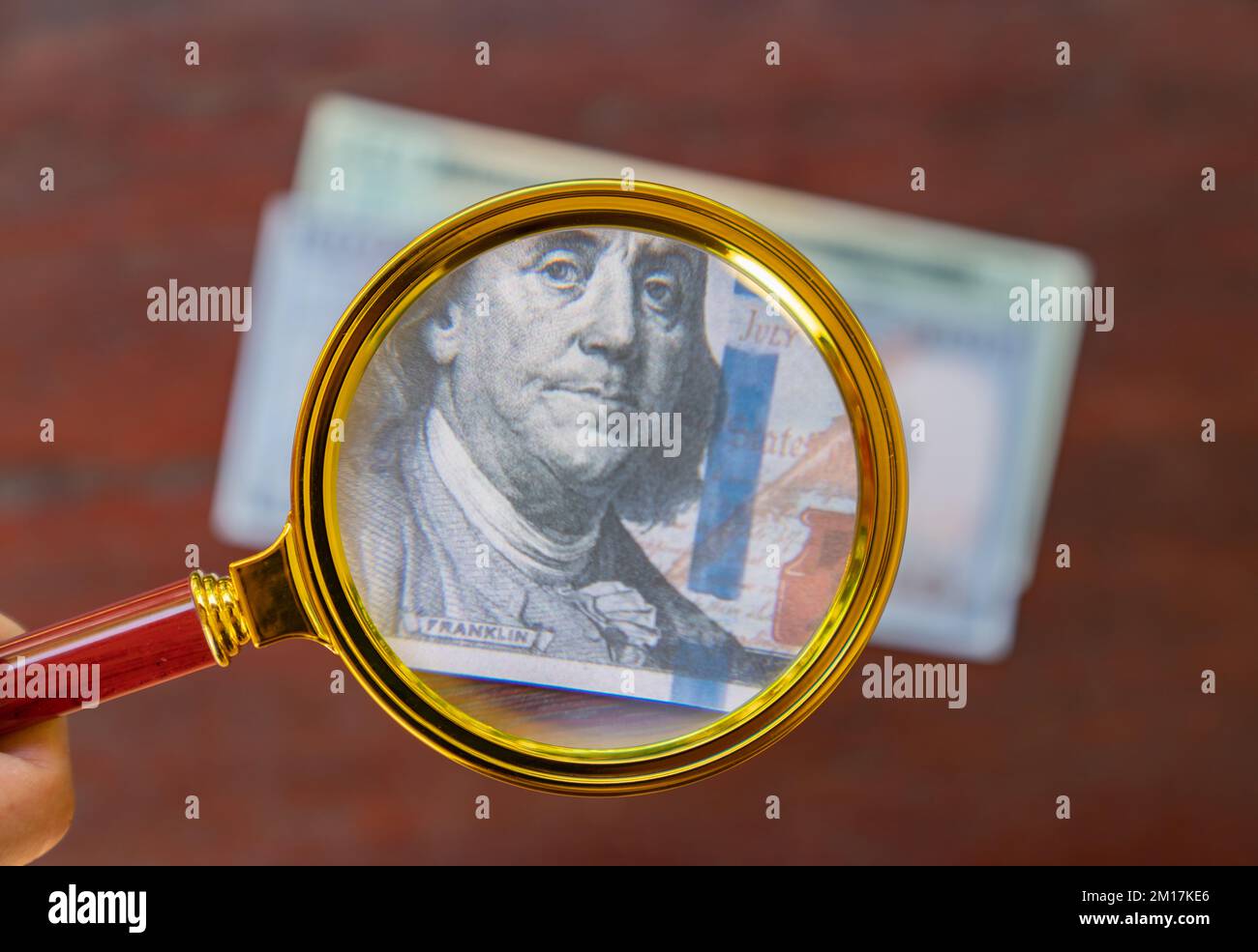 Dollar bill under a magnifying glass concept of money important Stock ...