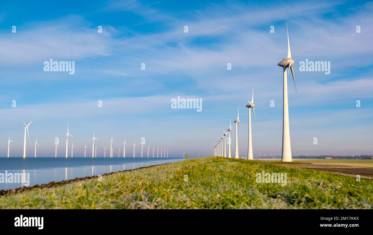 Aerial view at Windmill park with wind mill turbines during winter ...
