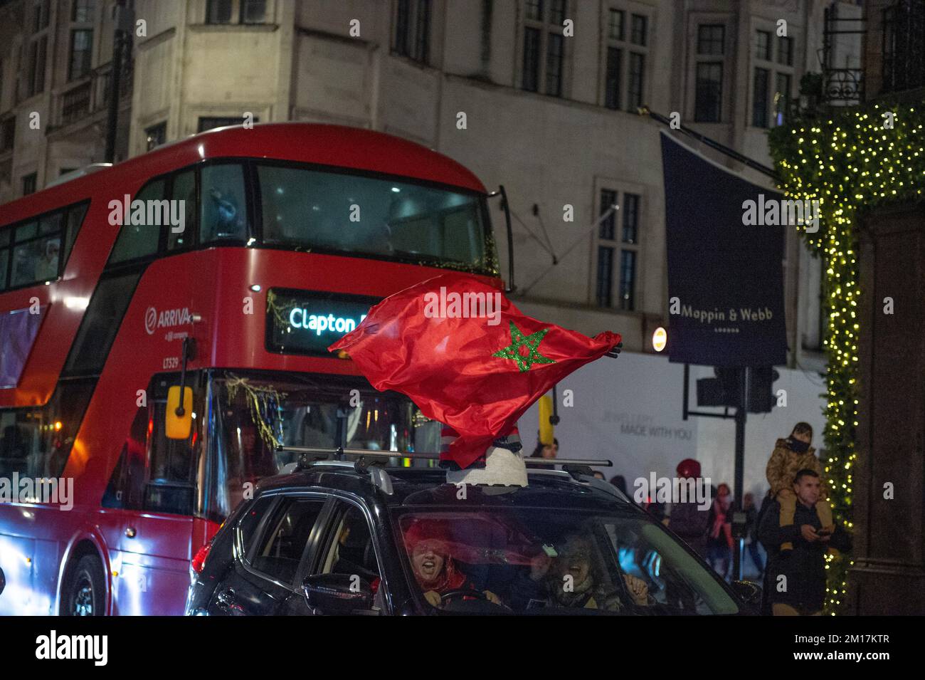 London, UK. 10th Dec, 2022. Thousands of Moroccan fans celebrate their ...