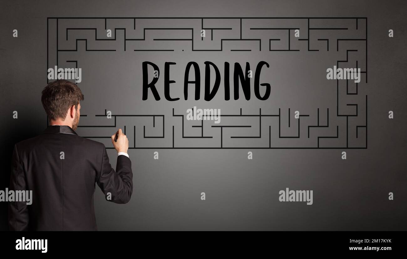 businessman drawing maze concept Stock Photo - Alamy