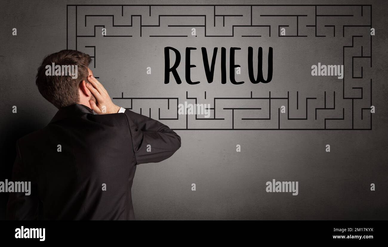 businessman drawing maze concept Stock Photo - Alamy