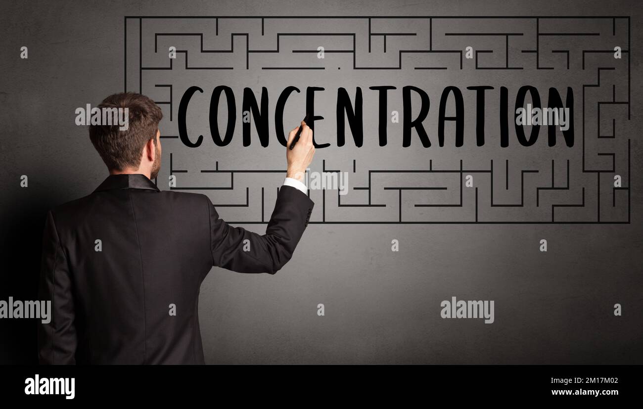 businessman drawing maze concept Stock Photo - Alamy