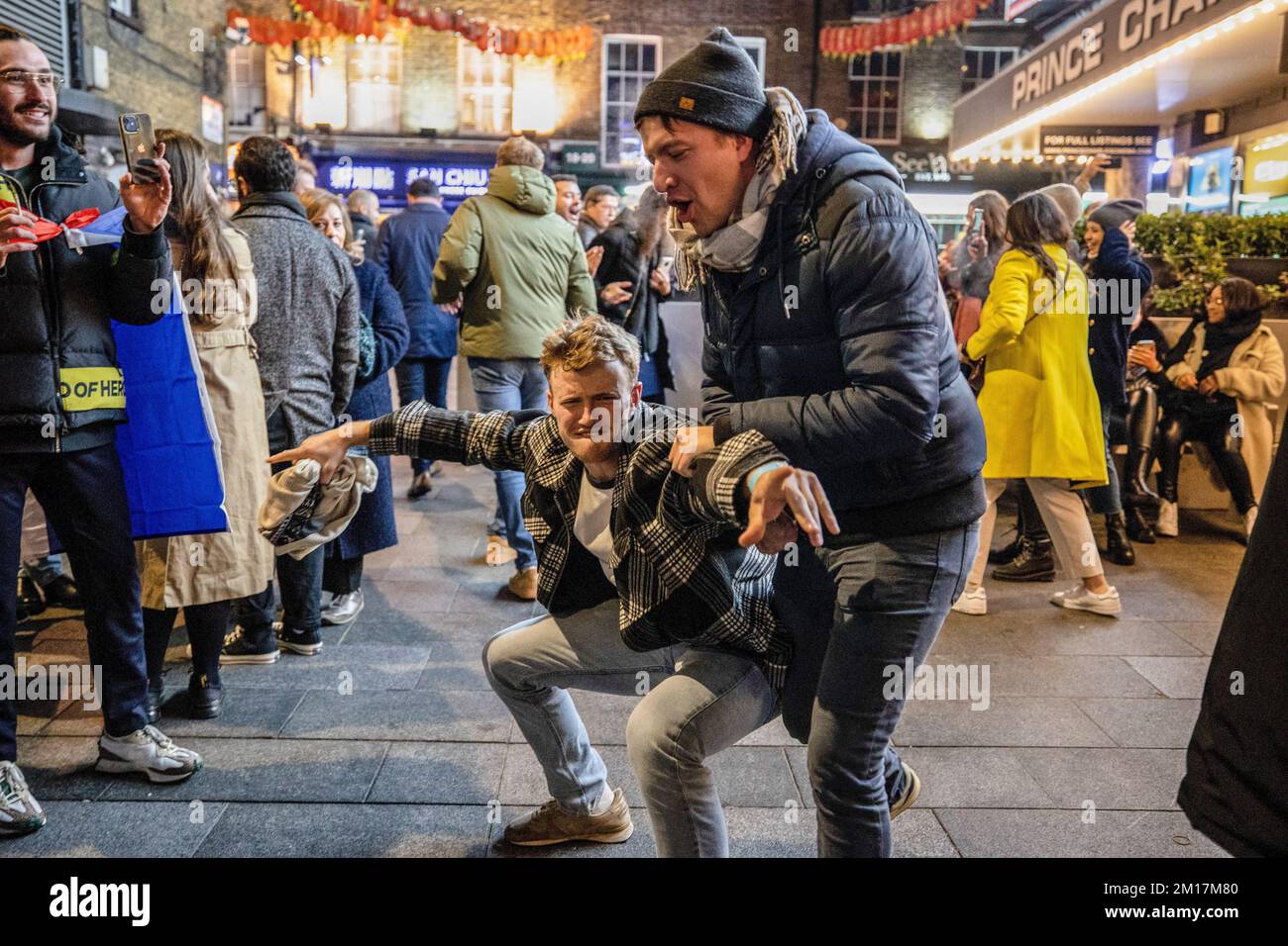 London, UK. 10th Dec, 2022. England football fans are seen getting ...