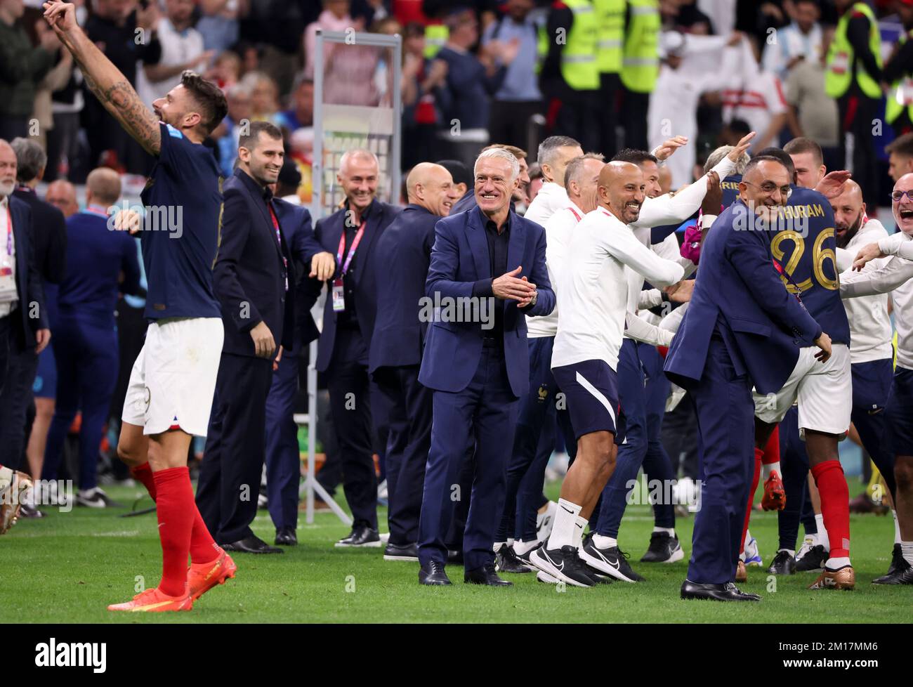 Coach of France Didier Deschamps and his staff celebrate the victory ...