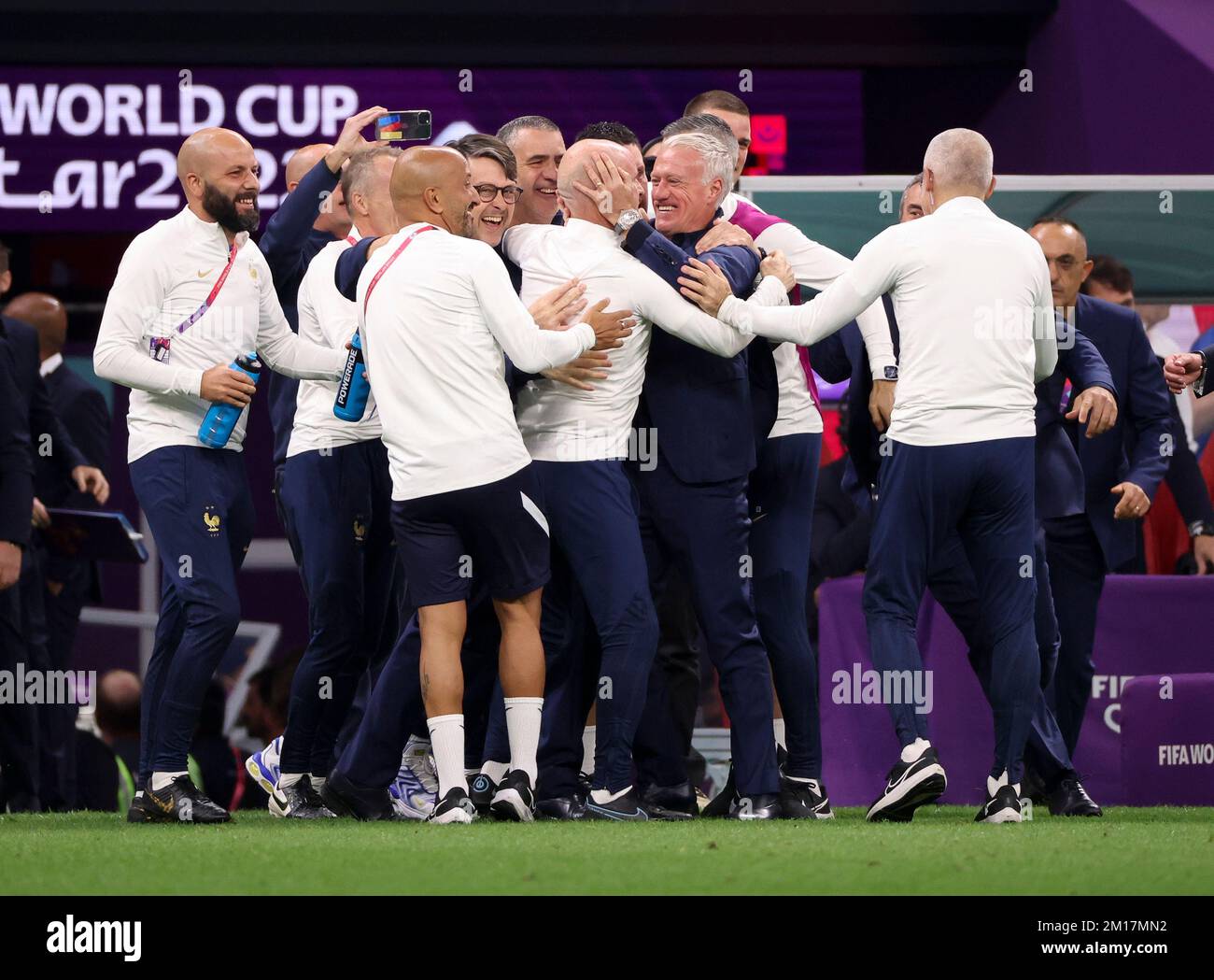 Coach of France Didier Deschamps hugging his assistant-coach Guy ...