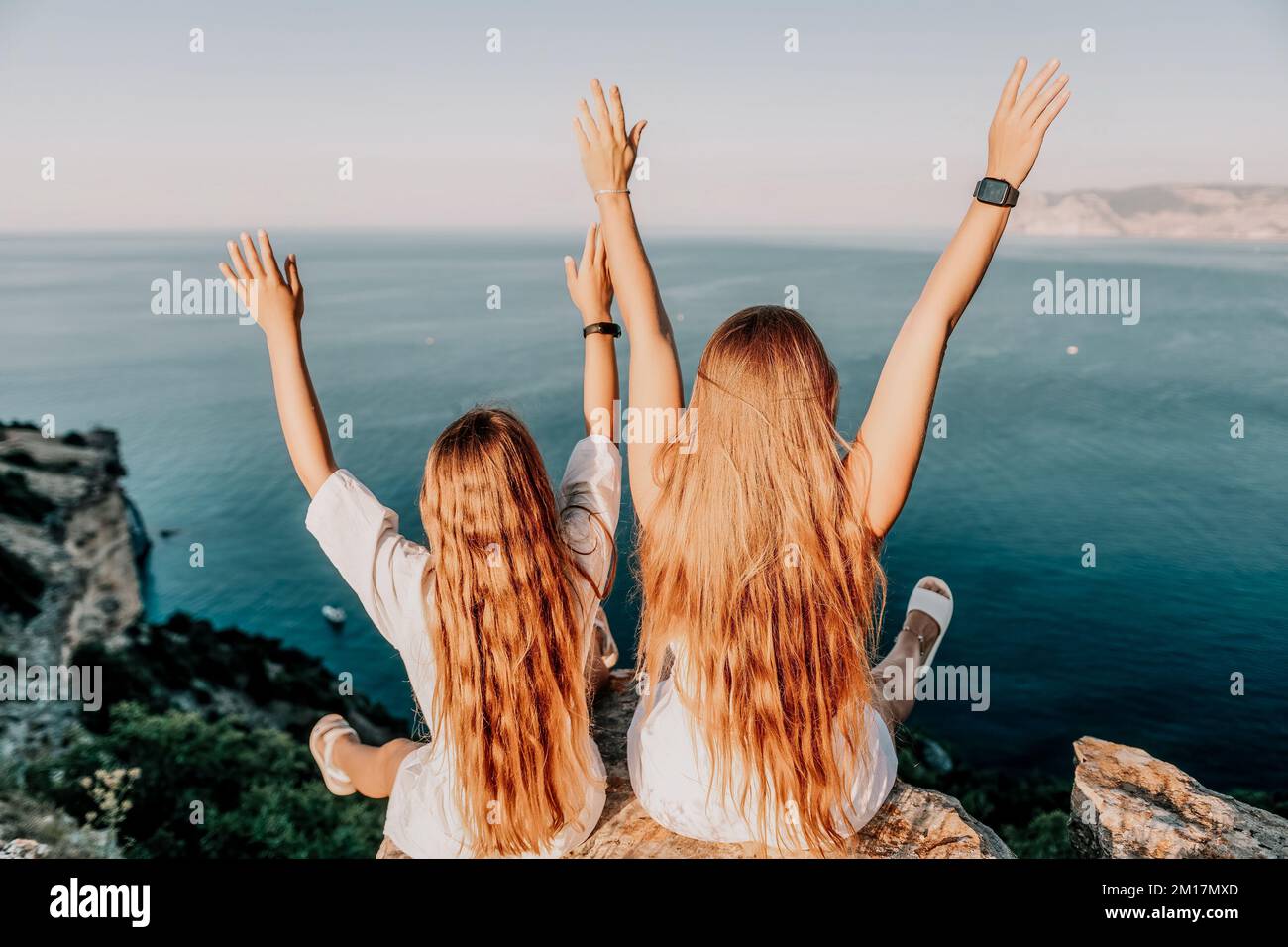 Sea family vacation together, happy mom and teenage daughter hugging ...