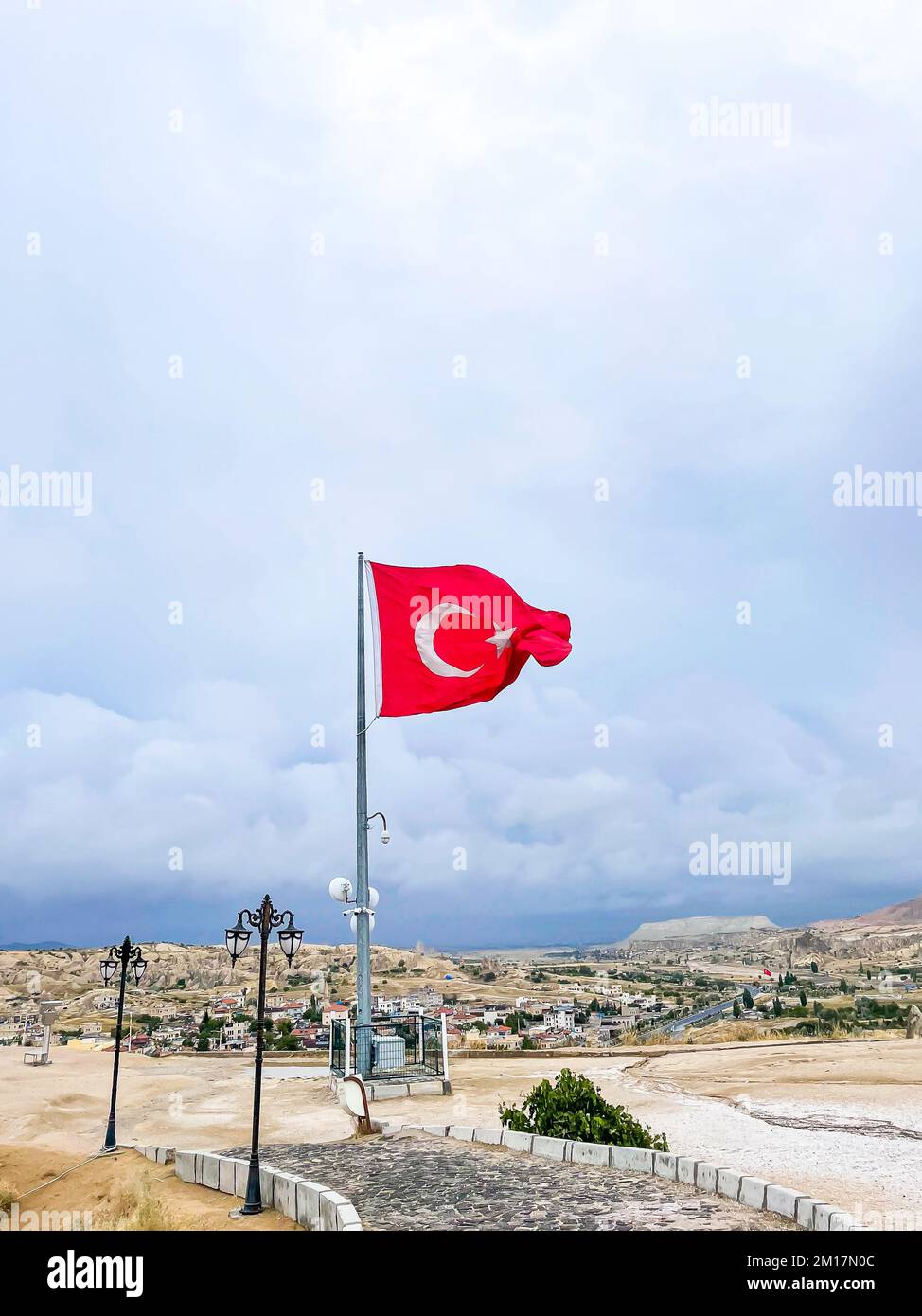 Turkish flag waving in blue sky in Cappadocia Stock Photo - Alamy