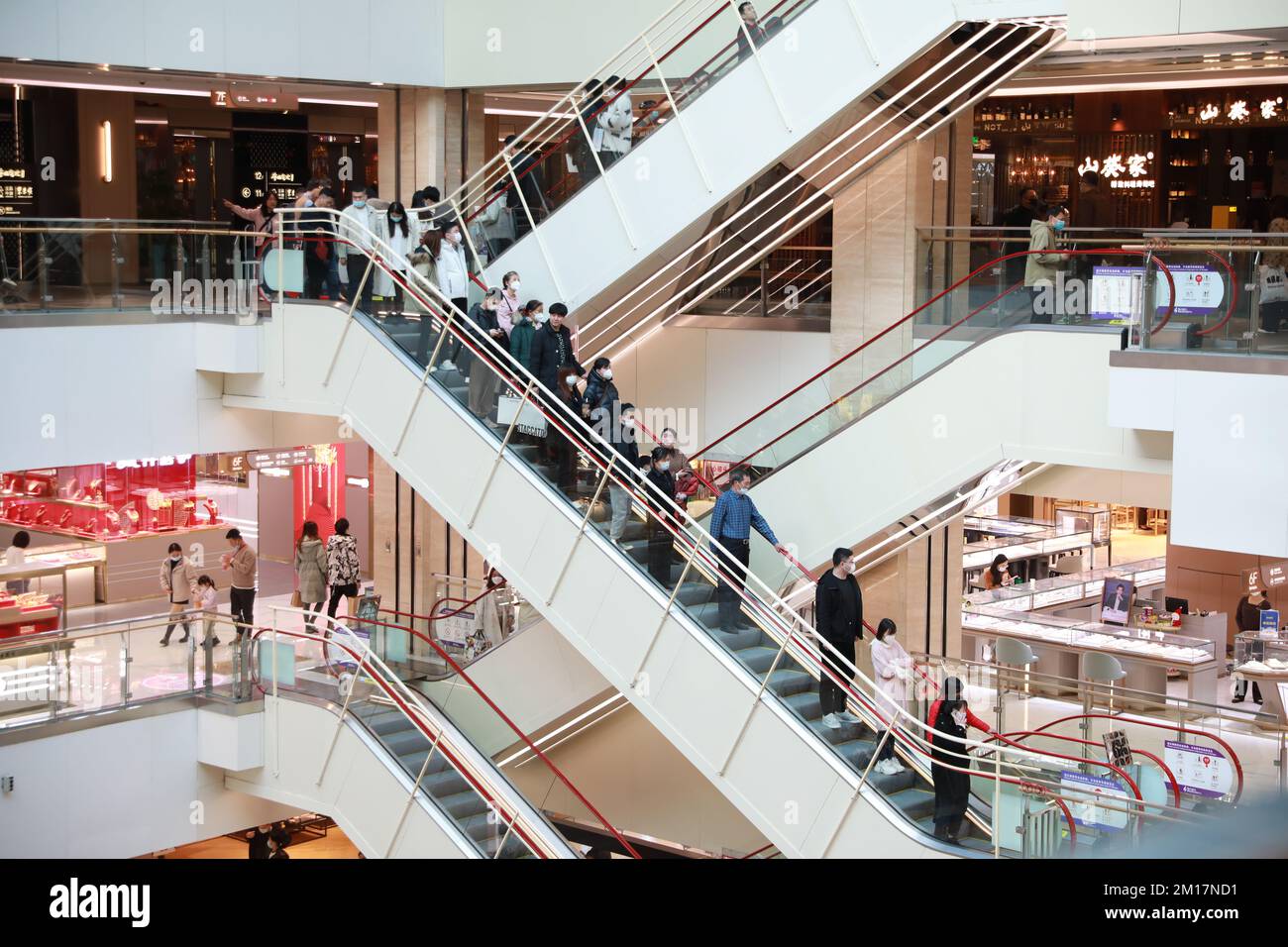 XI'AN, CHINA - DECEMBER 10, 2022 - People shop at a mall in Xi 'an ...