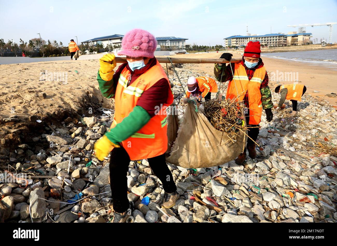 LIANYUNGANG, CHINA - DECEMBER 11, 2022 - Sanitation volunteers and ...