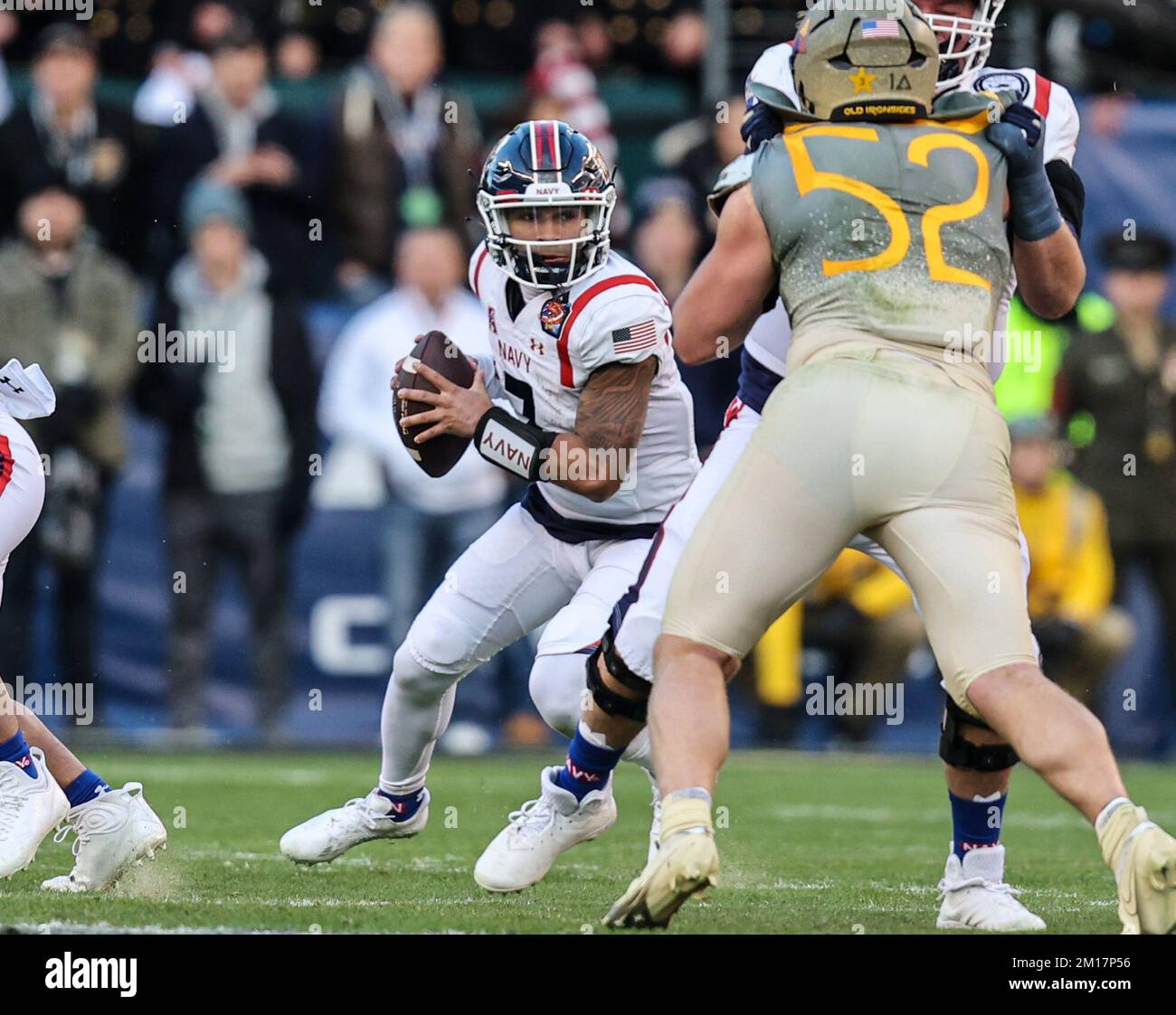 December 10, 2022: Navy Midshipmen quarterback Xavier Arline (7) steps ...