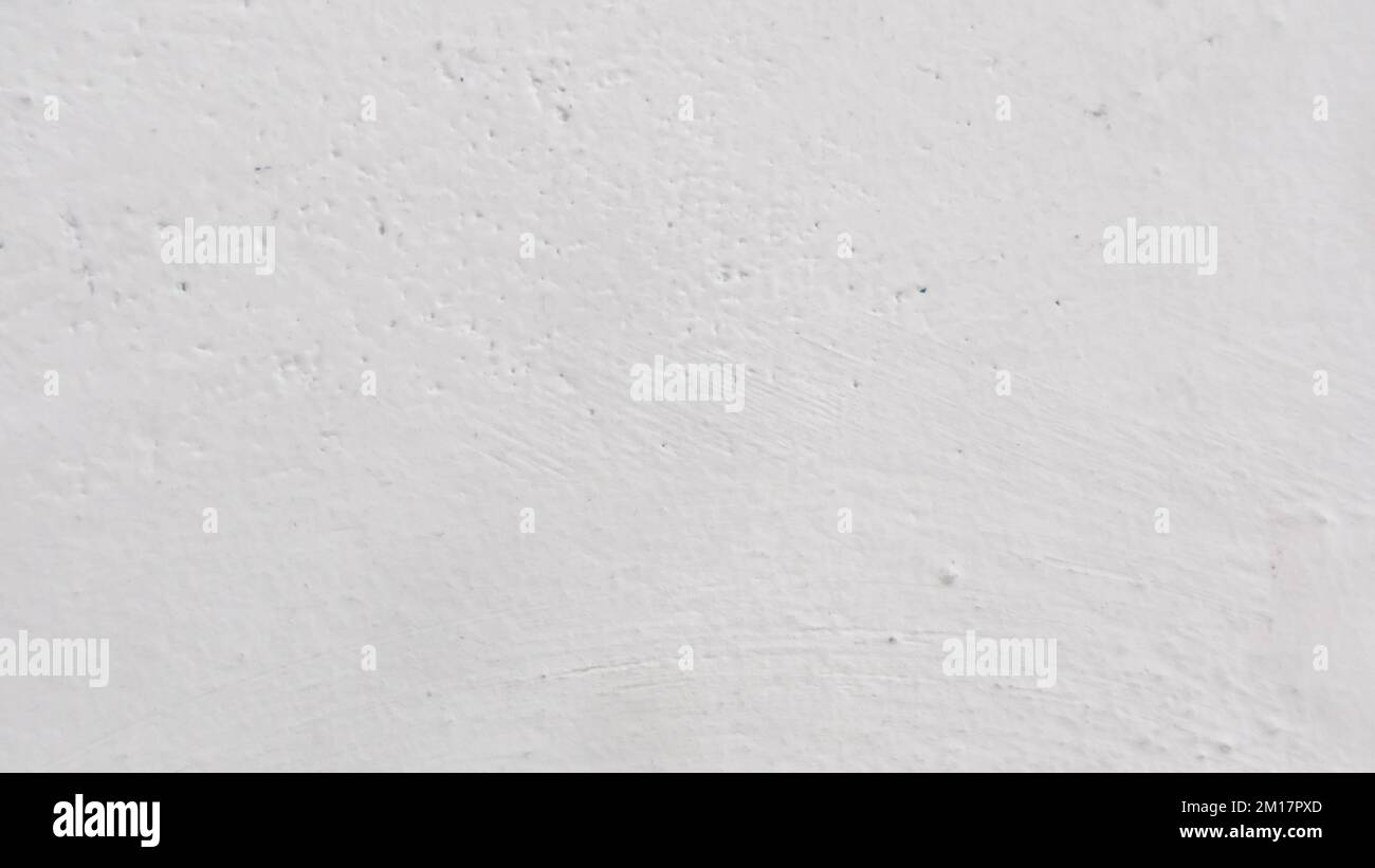 concrete wall texture with white paint as background Stock Photo - Alamy