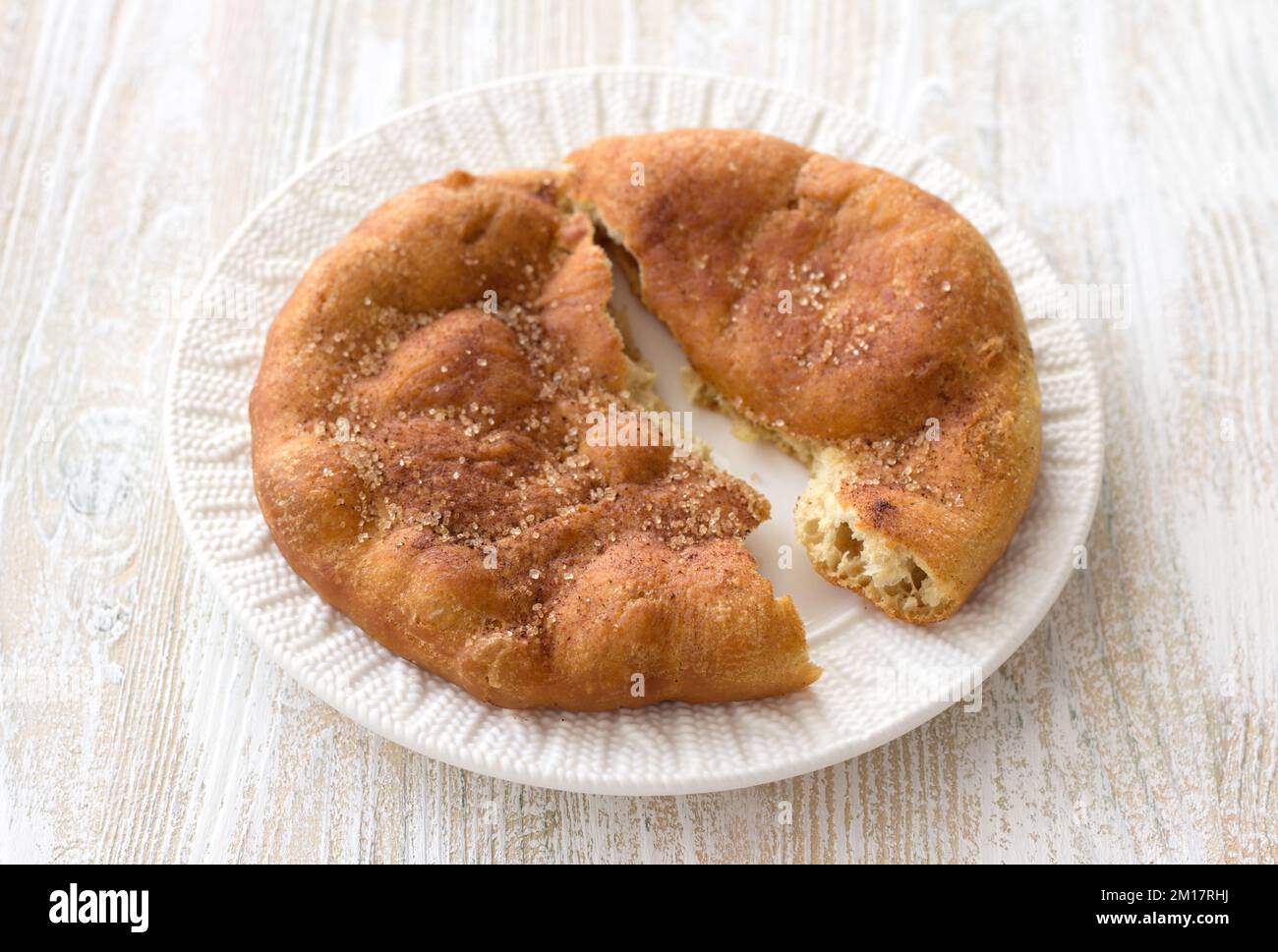 Homemade Navajo fried bread or sweet Elephant Ears with brown sugar and ...