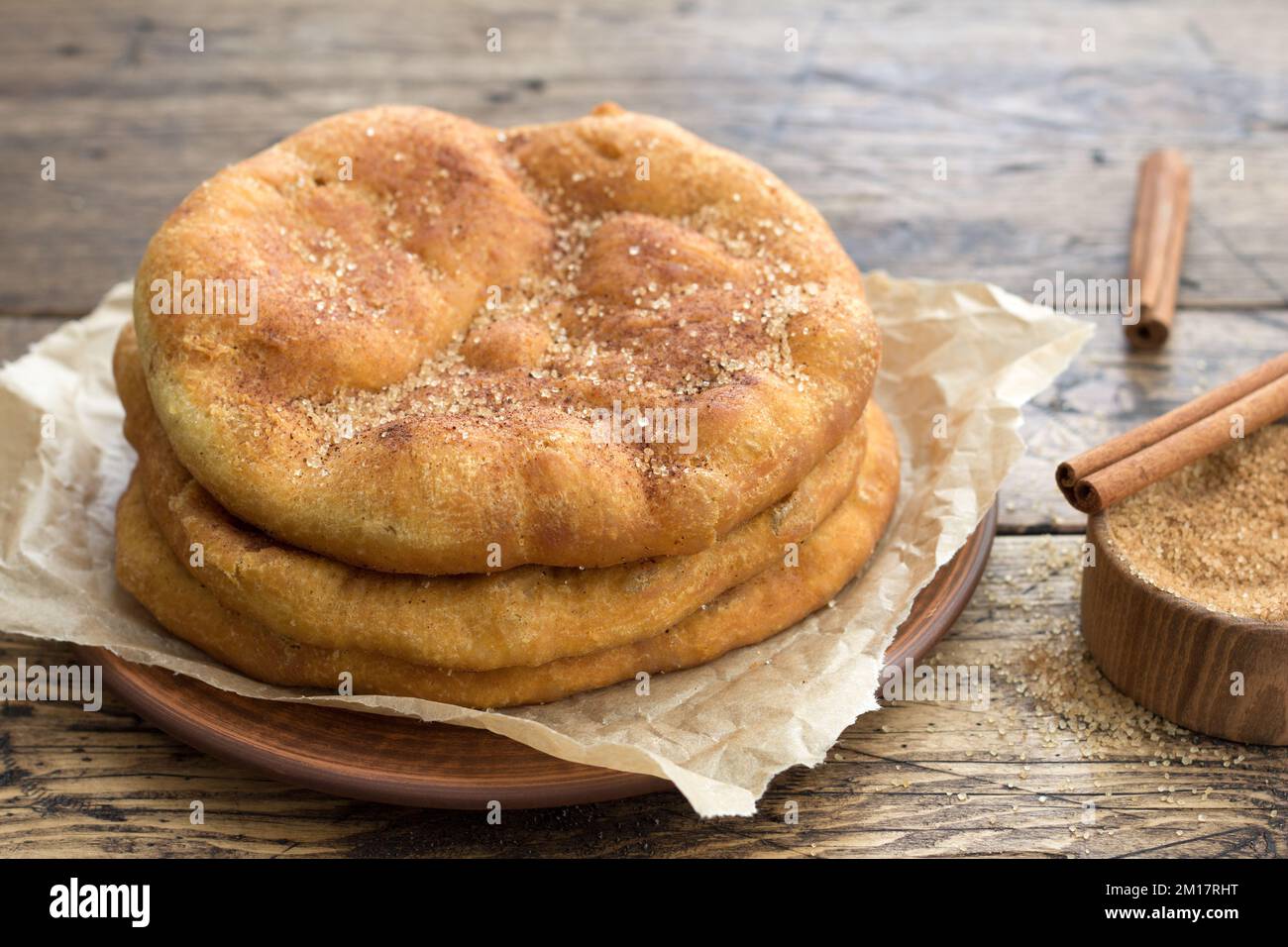 Homemade Navajo fried bread or sweet Elephant Ears with brown sugar and ...