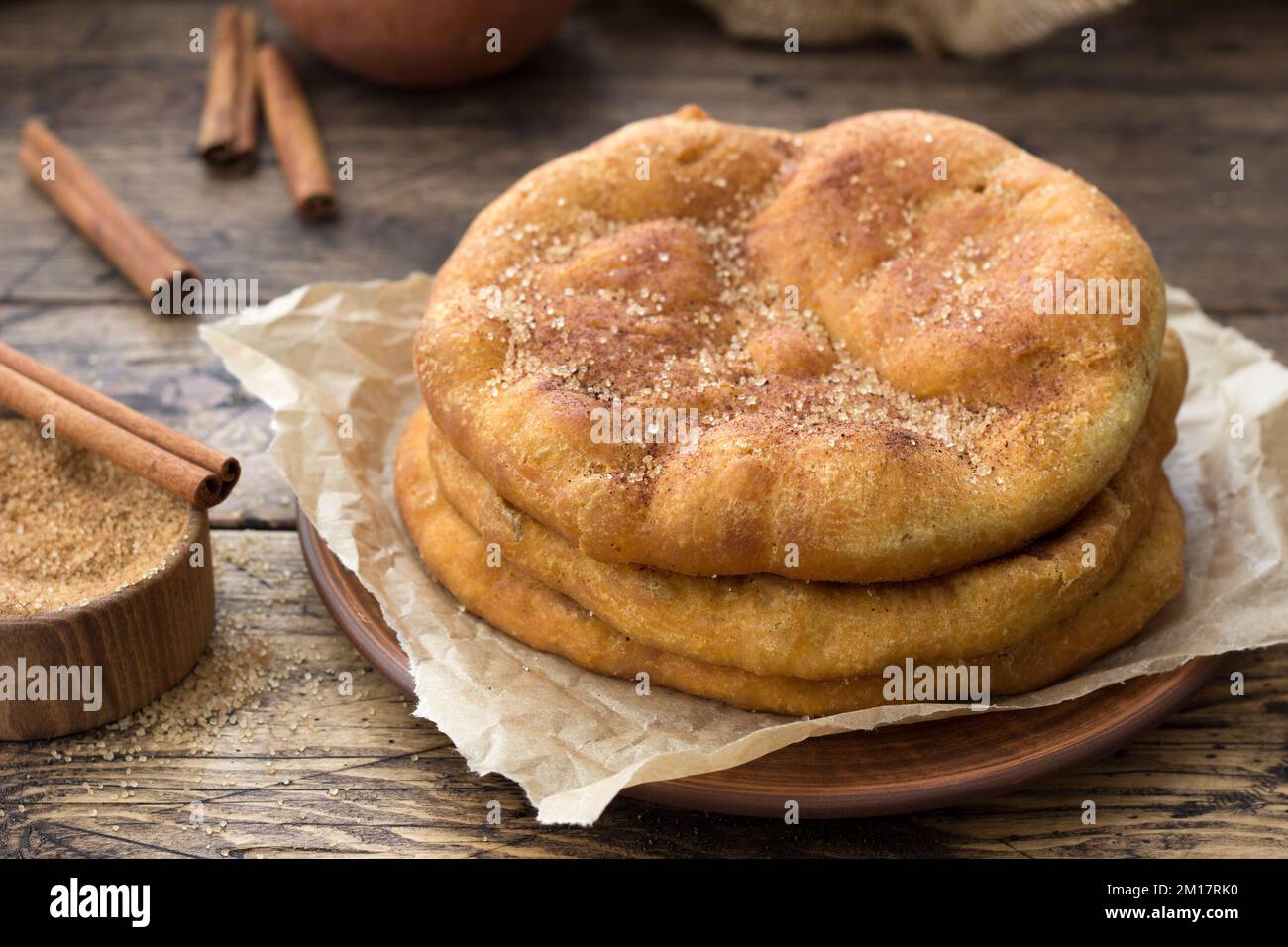 Homemade Navajo fried bread or sweet Elephant Ears with brown sugar and ...