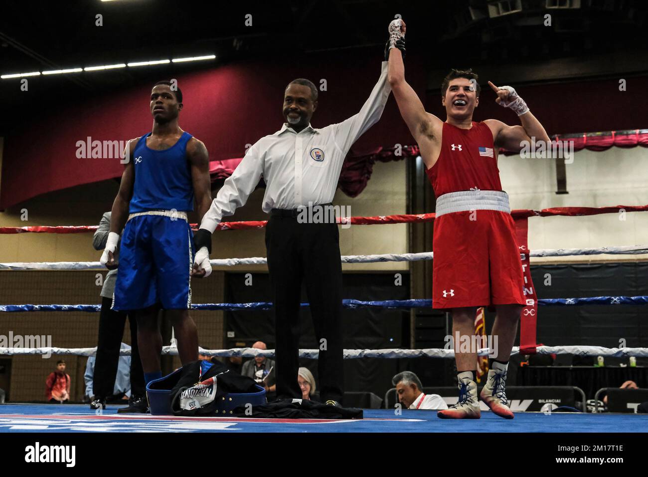 Lubbock, TX, USA. 10th Dec, 2022. Nathan Lugo of Marietta, GA (red) is ...