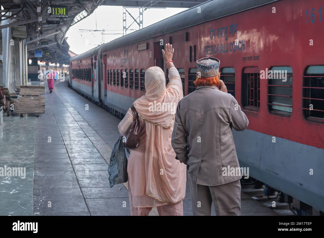 A Muslim couple at Chhatrapati Shivaji Maharaj Terminus, Mumbai, India ...