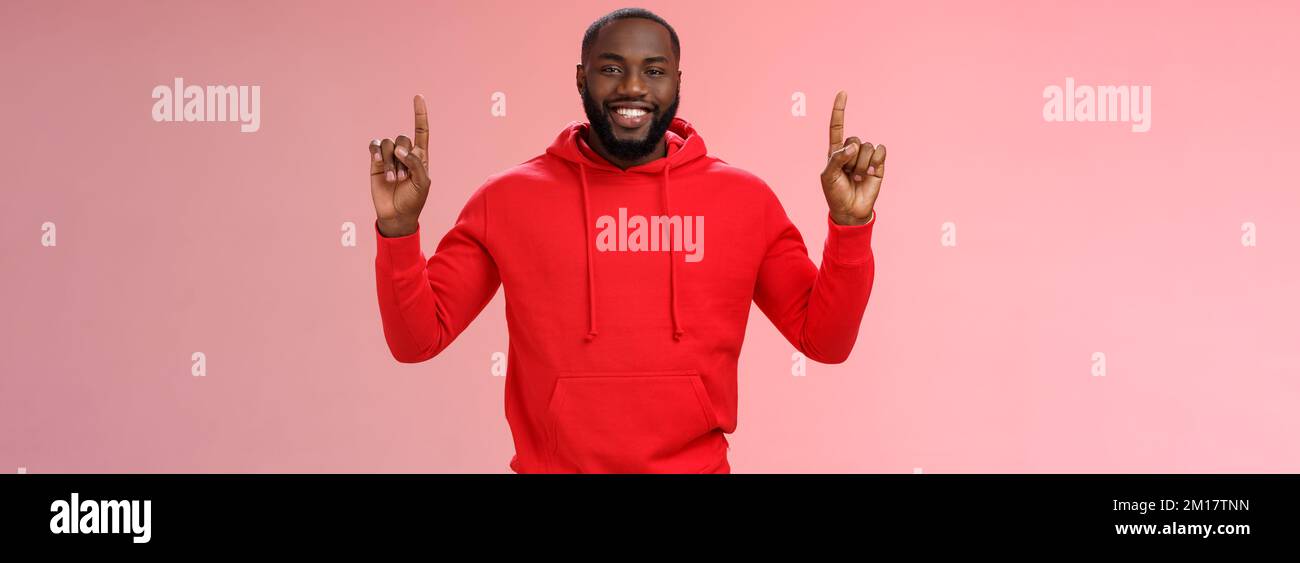 Devious cute african-american bearded guy in red hoodie smiling ...