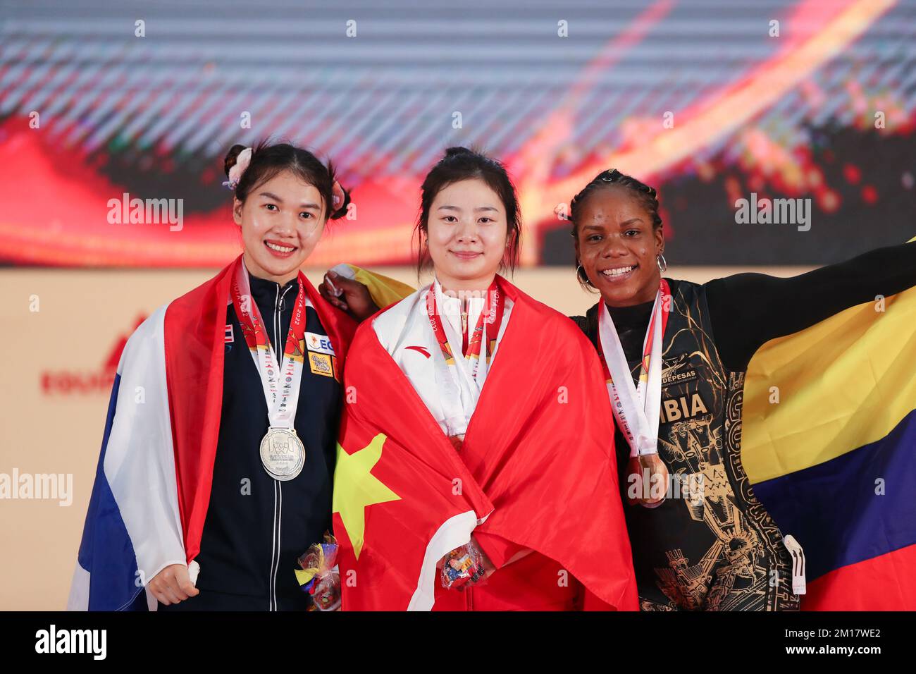 Bogota, Colombia. 10th Dec, 2022. Pei Xinyi (C) of China poses for ...