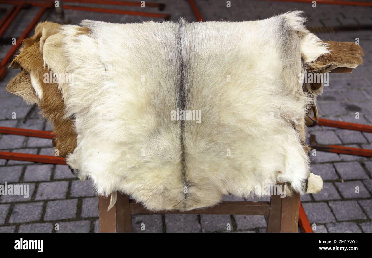 Detail of animal skins in an old market Stock Photo - Alamy