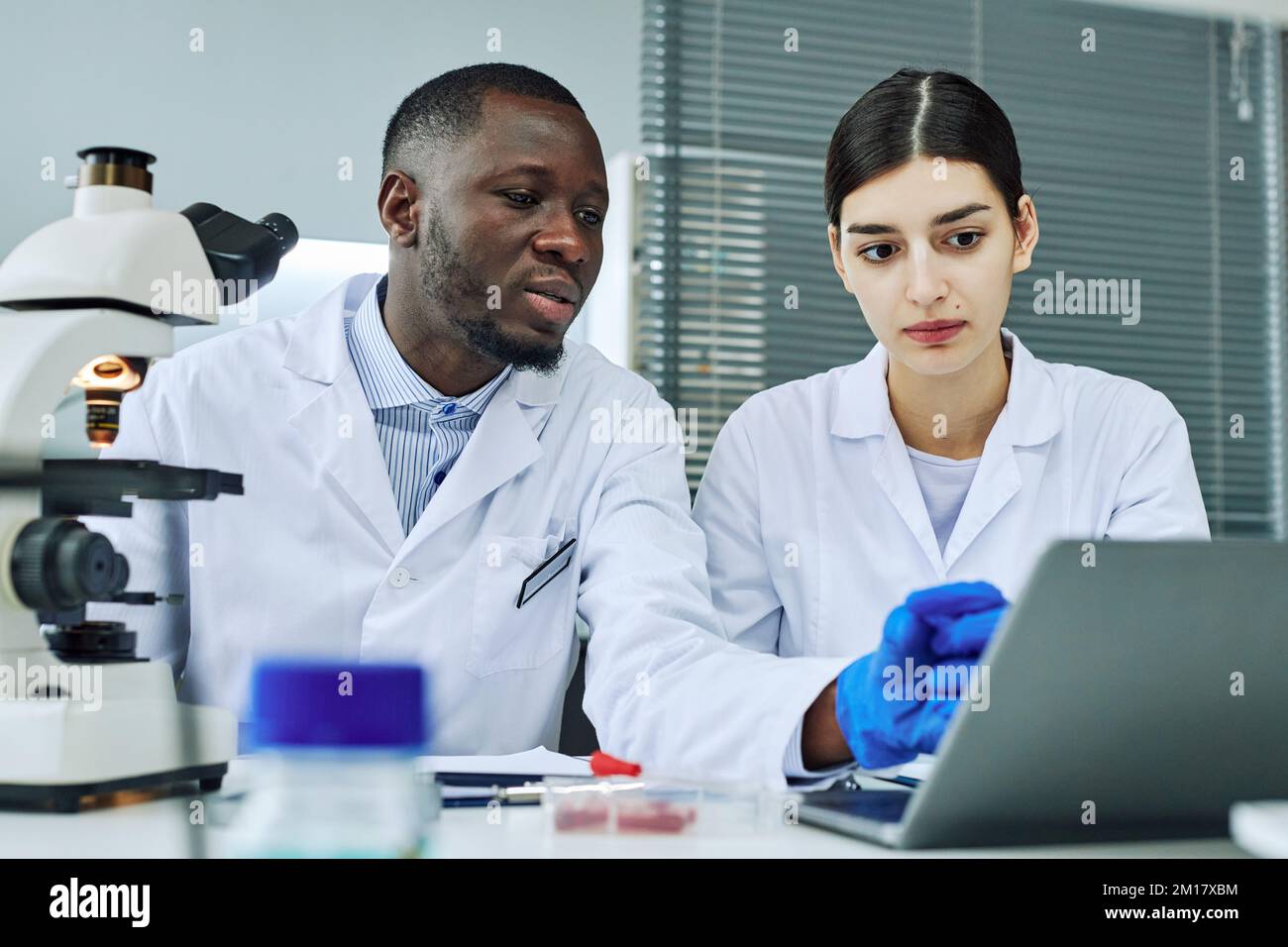 Black man laboratory computer screen hi-res stock photography and ...