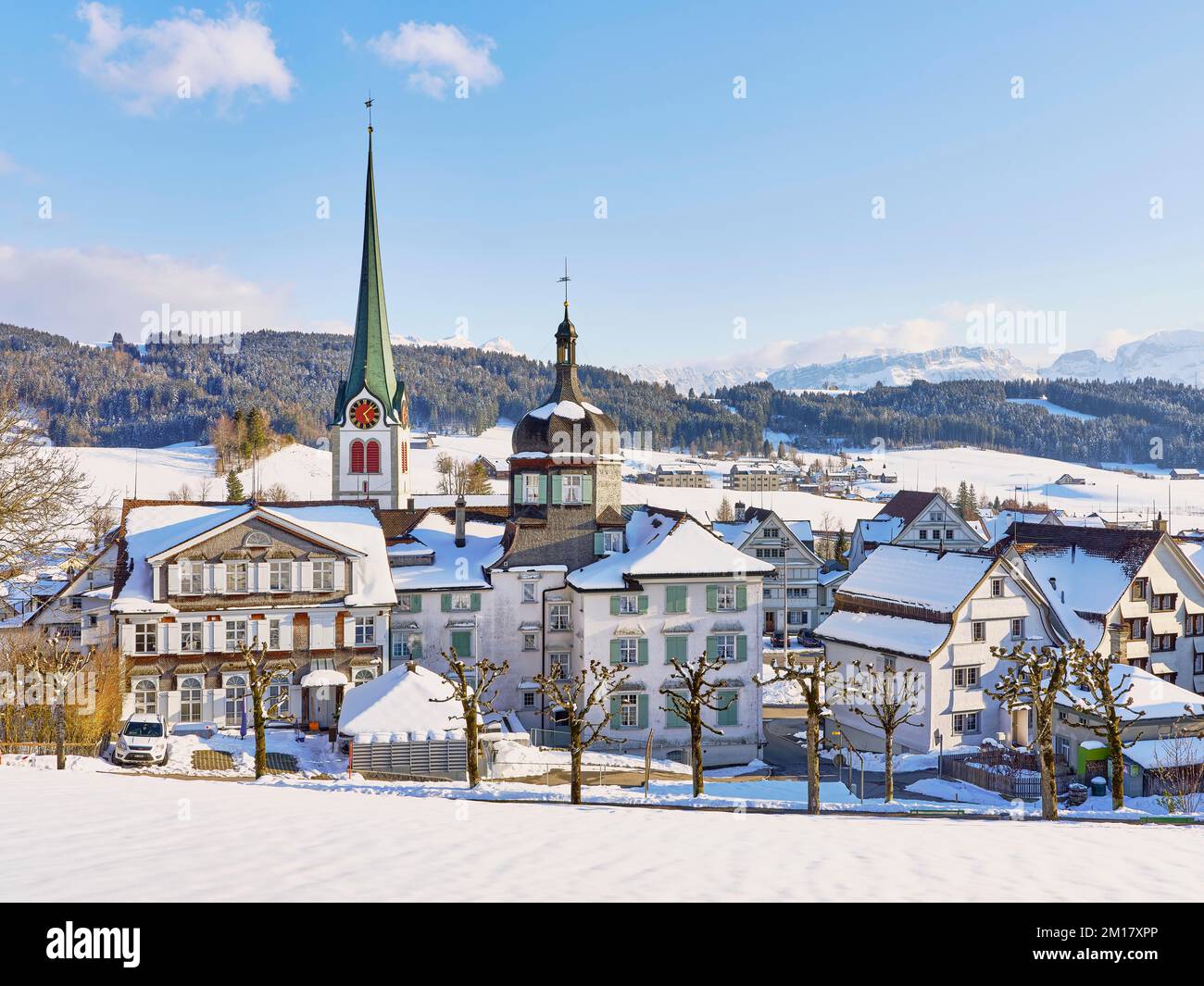 Snow-covered village view with typical Appenzell houses facing south ...