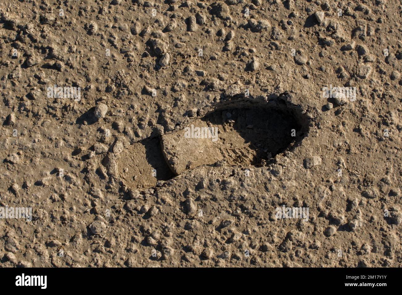 Footstep pattern seen on a concrete background Stock Photo - Alamy