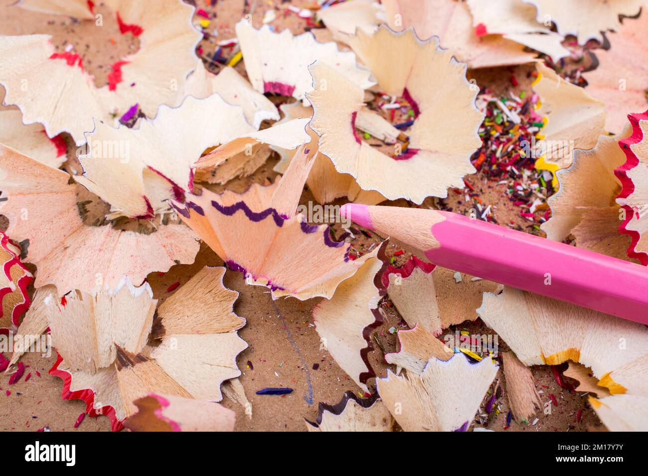 Red Color Pencil over pencil shavings Stock Photo - Alamy
