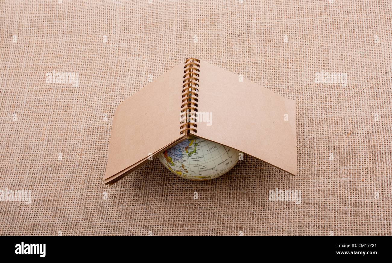 Globe is placed on canvas background Stock Photo - Alamy