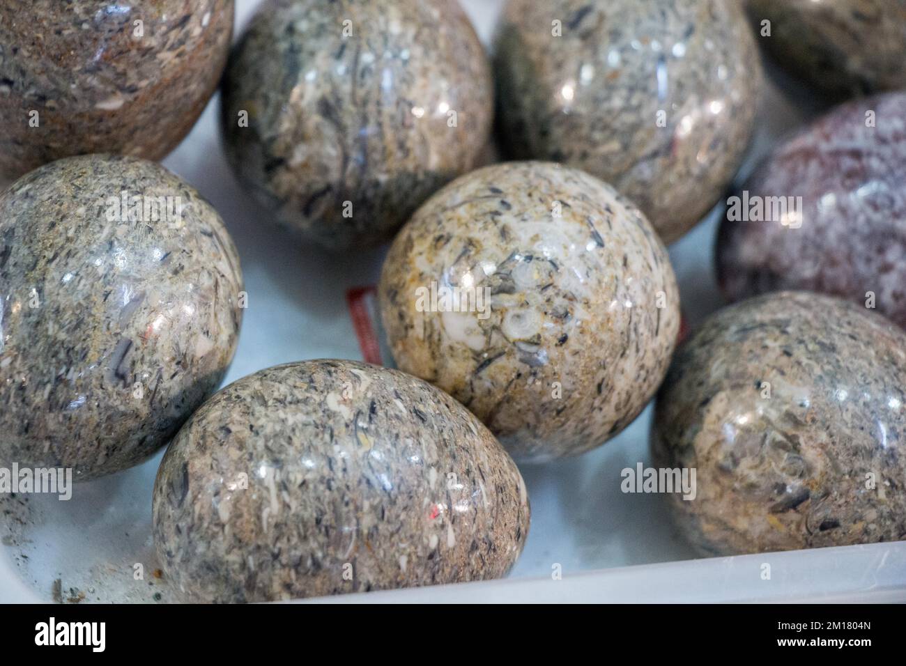 Plenty of marbles in the form of an egg Stock Photo - Alamy