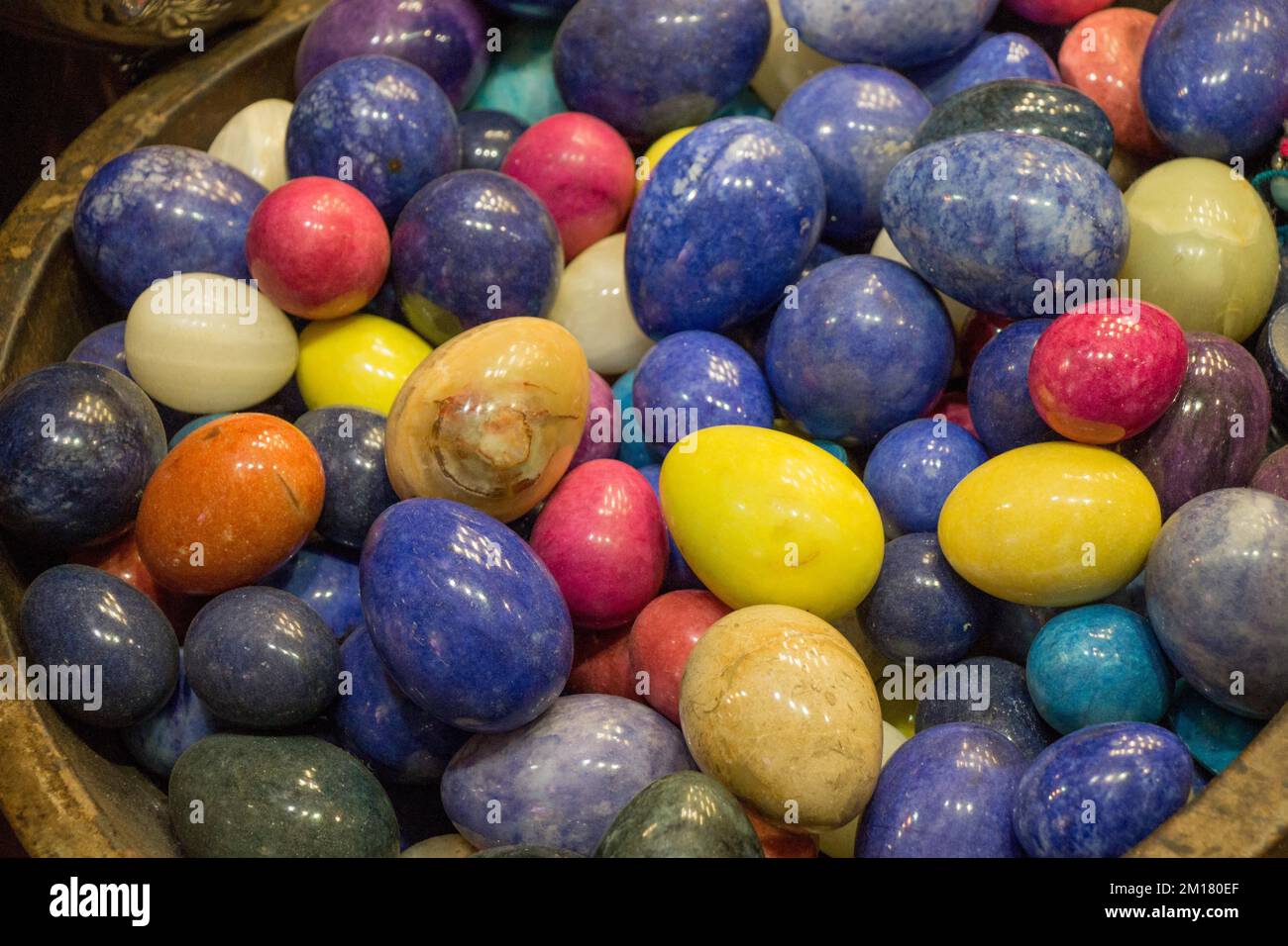 Plenty of marble stones in the form of colorful egg Stock Photo - Alamy