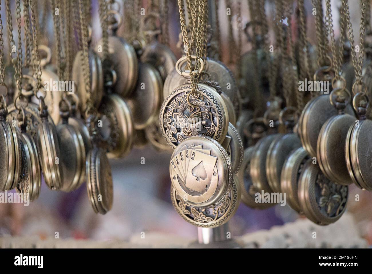 Set of retro styled pocket watches hanging Stock Photo - Alamy