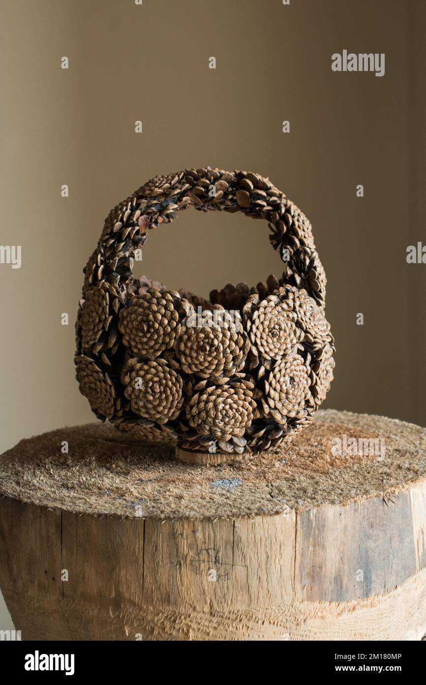 Basket of pine cones hi-res stock photography and images - Alamy