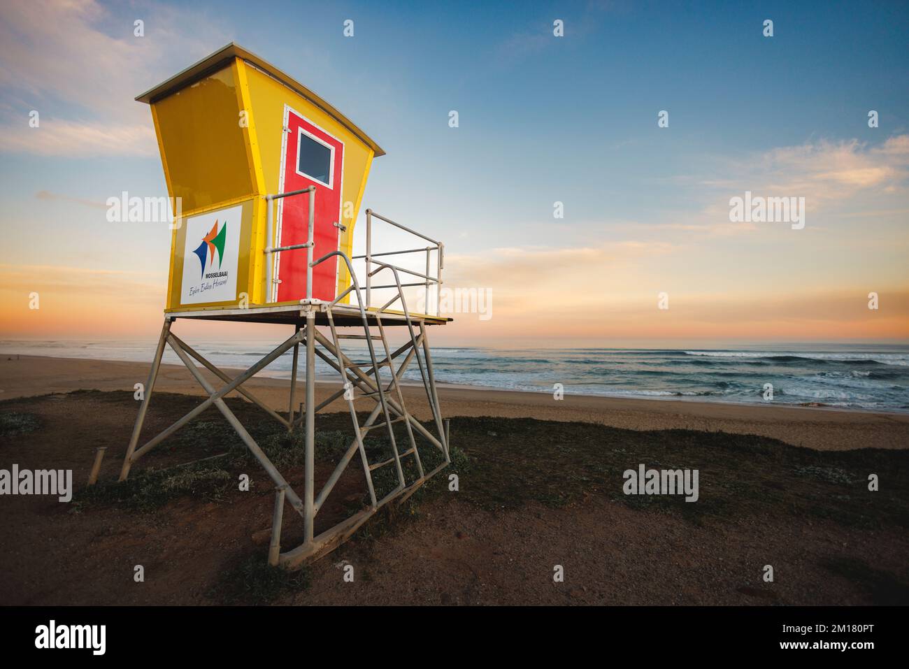 A lifeguard watchtower overlooking the Indian Ocean during sunset Stock ...