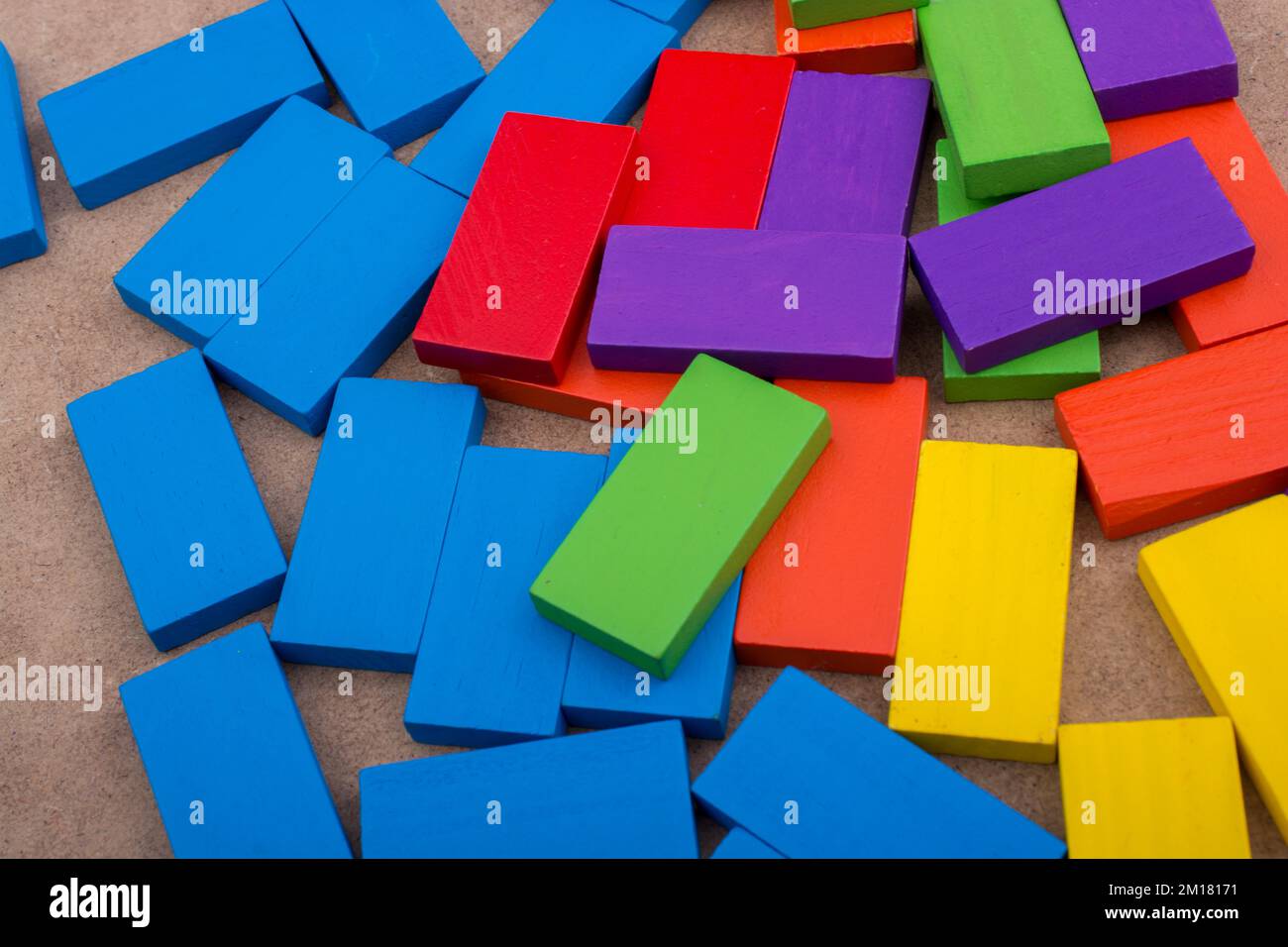Wooden blocks of various color randomly scattered Stock Photo - Alamy